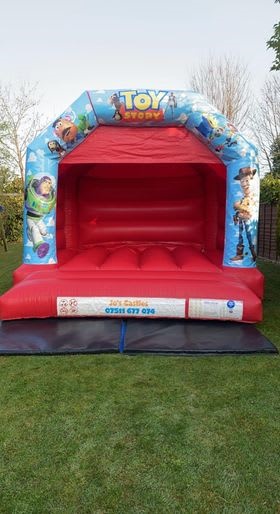 Red Toy Story Castle - Hire in colchester | joscastles